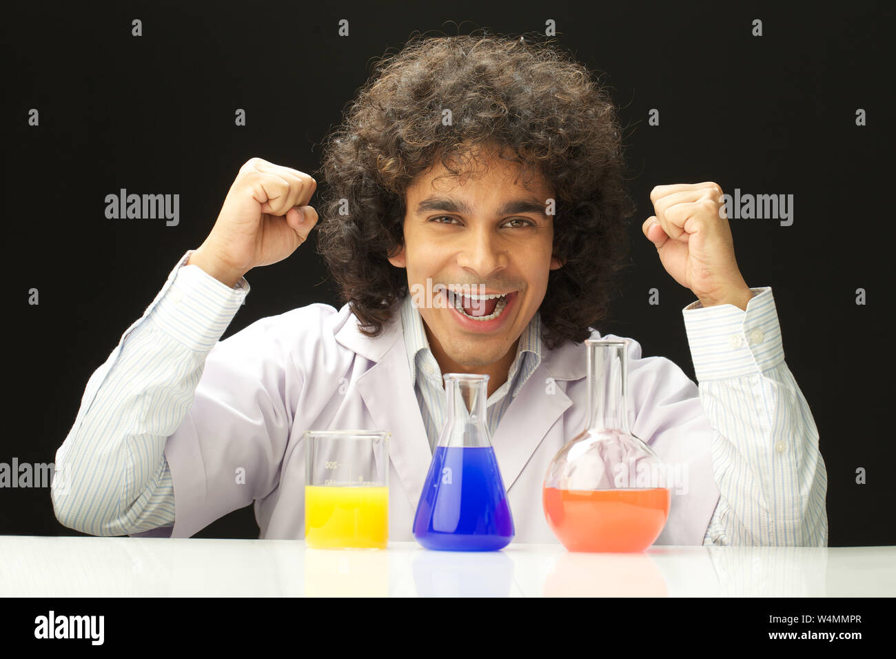 Scientist celebrating his success Stock Photo - Alamy