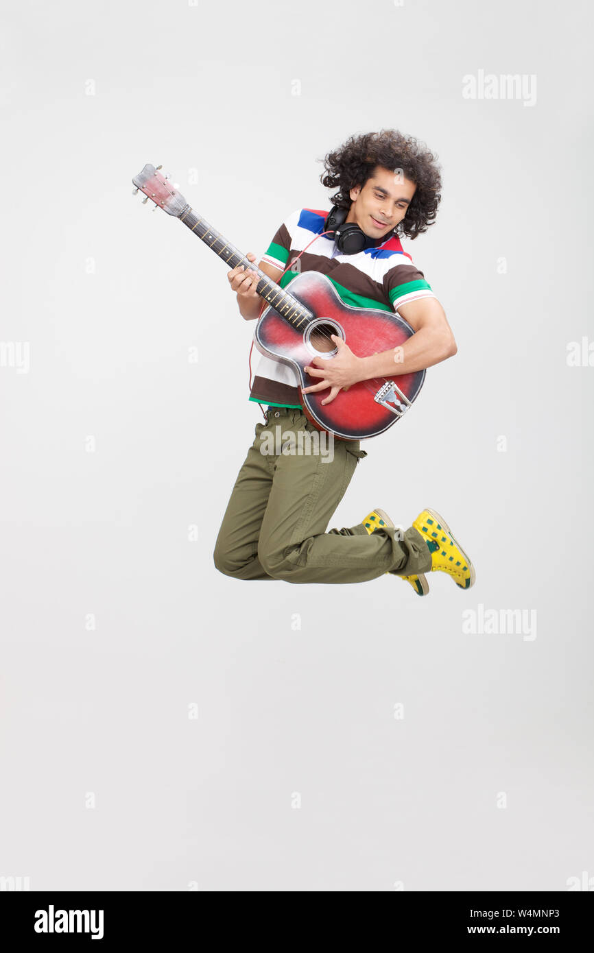 Indian man jumping hi-res stock photography and images - Alamy