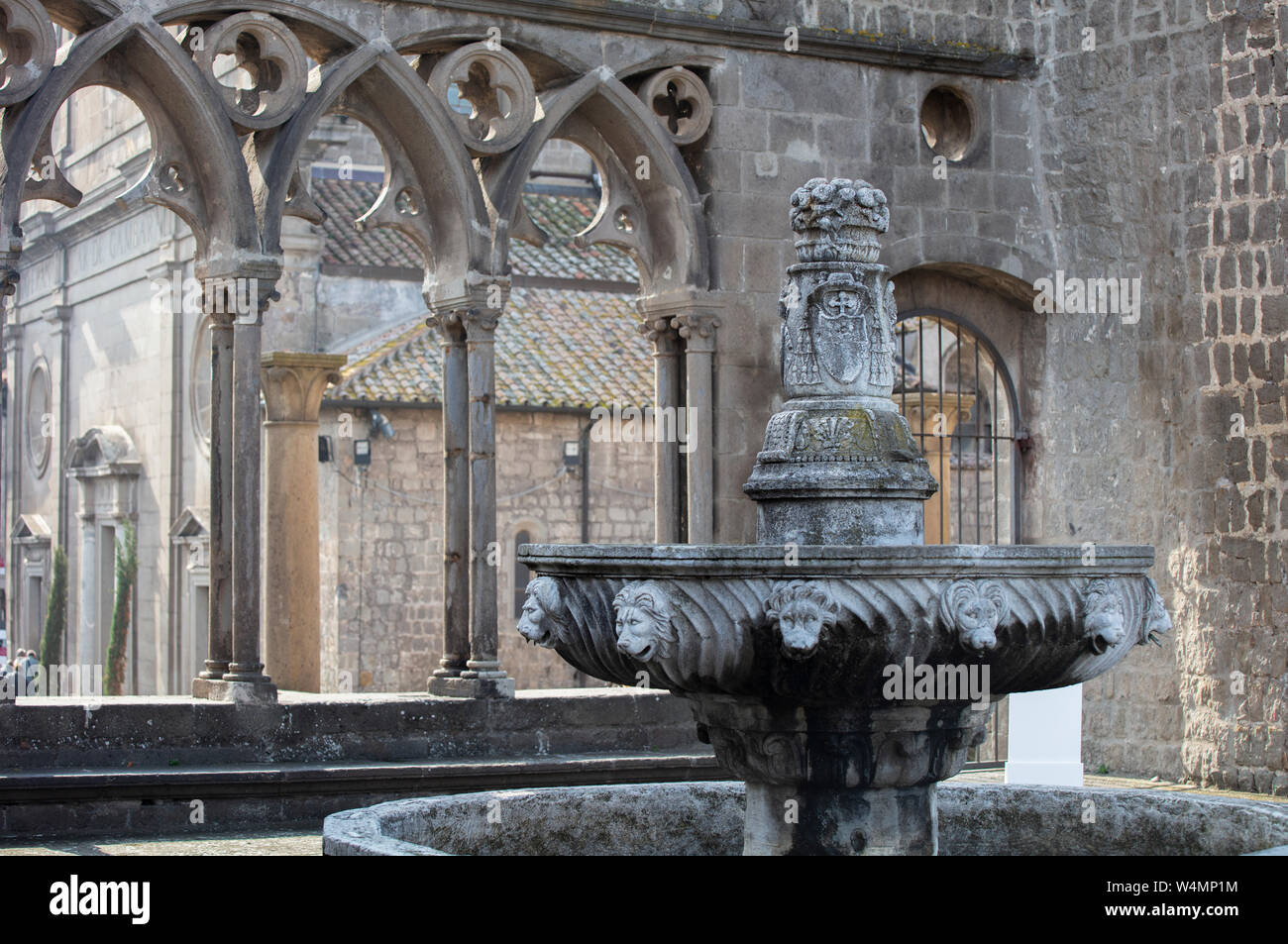 A view of the gothic arcade and the fountain in the loggia of the Papal ...