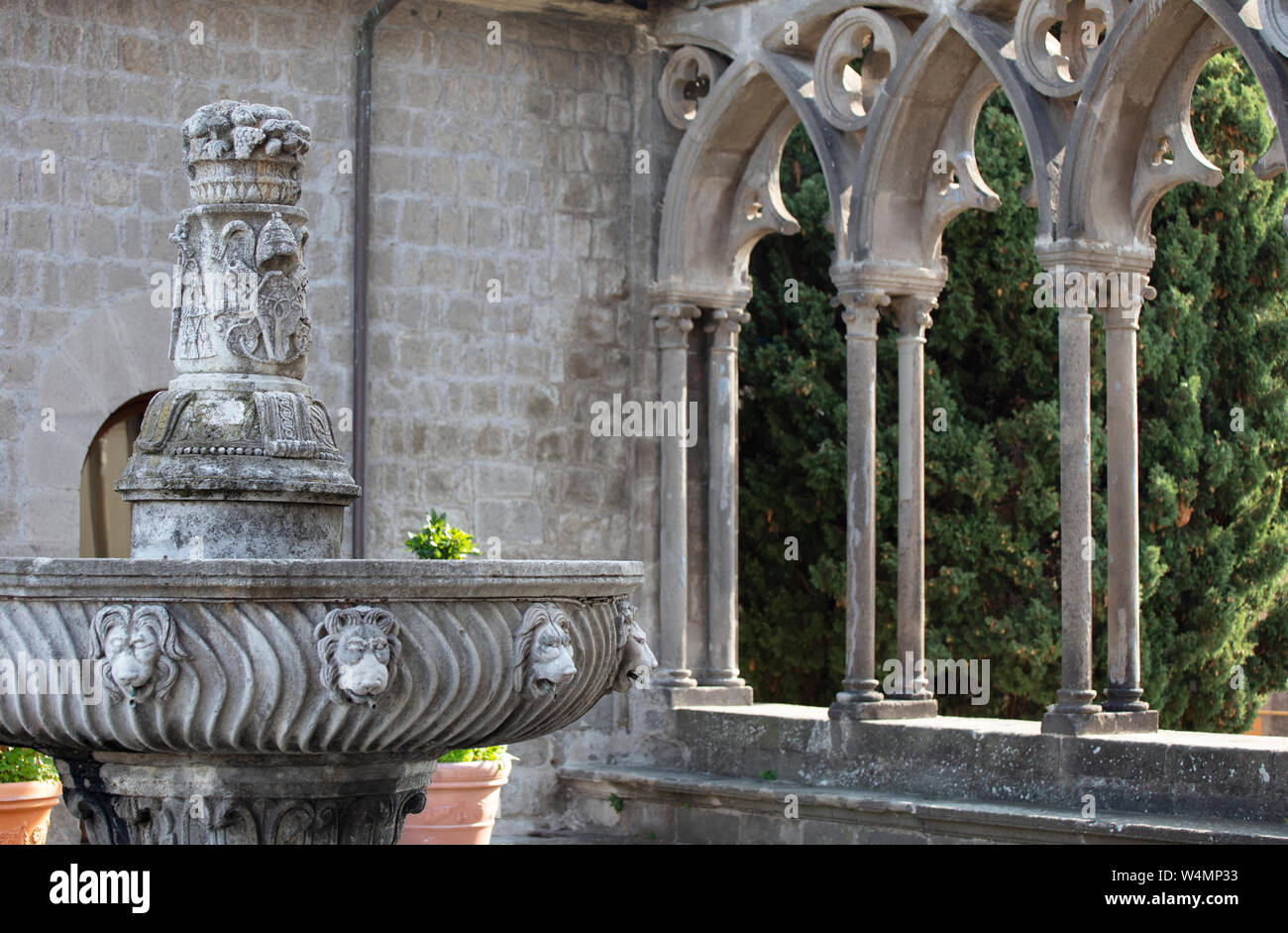 A view of the gothic arcade and the fountain in the loggia of the Papal ...