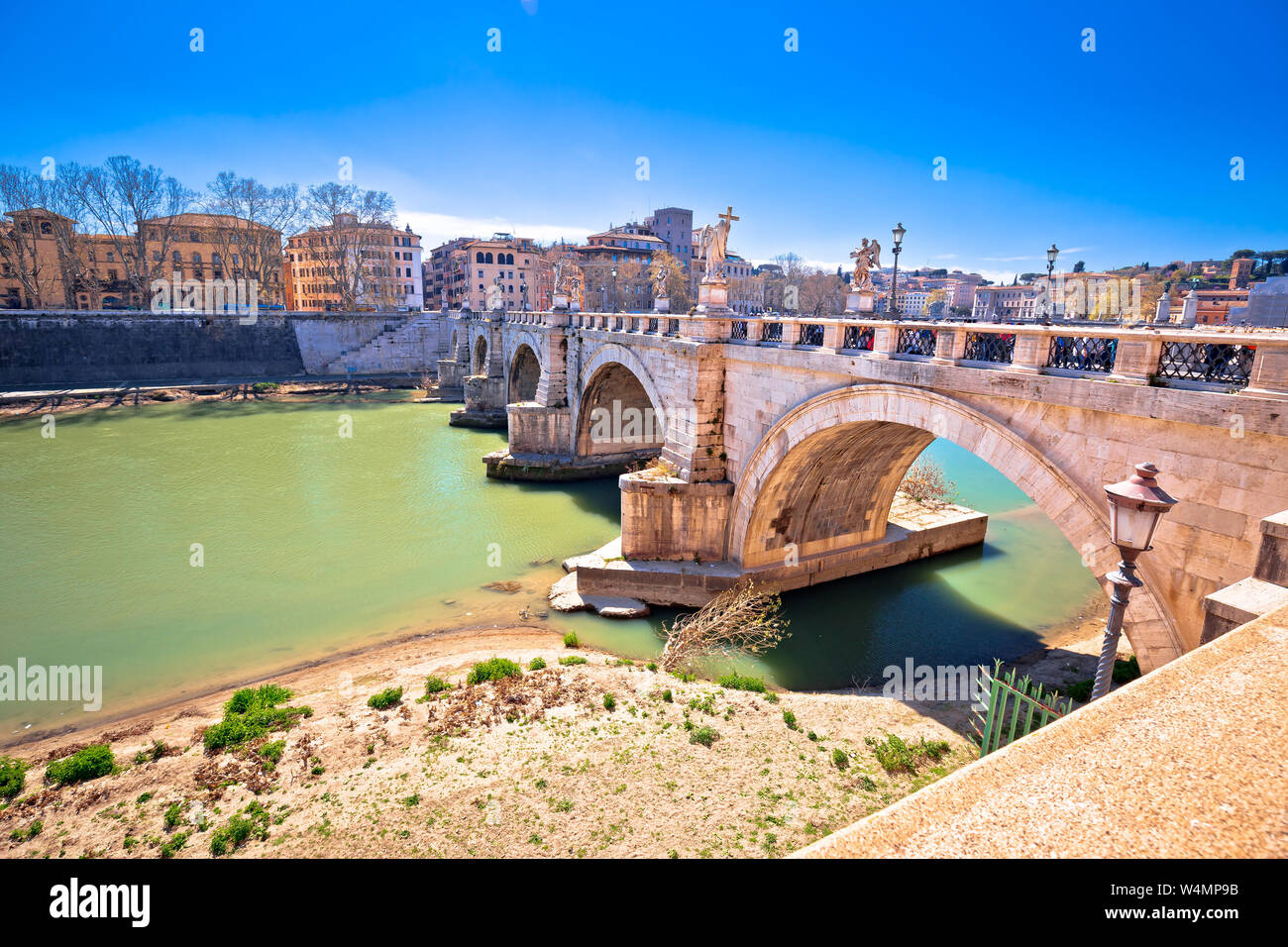 Ancient Ponte Sant Angelo stone bridge on Tiber river of Rome, capital ...