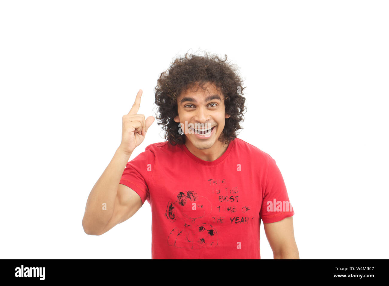 Portrait of a man laughing with pointing upward Stock Photo - Alamy