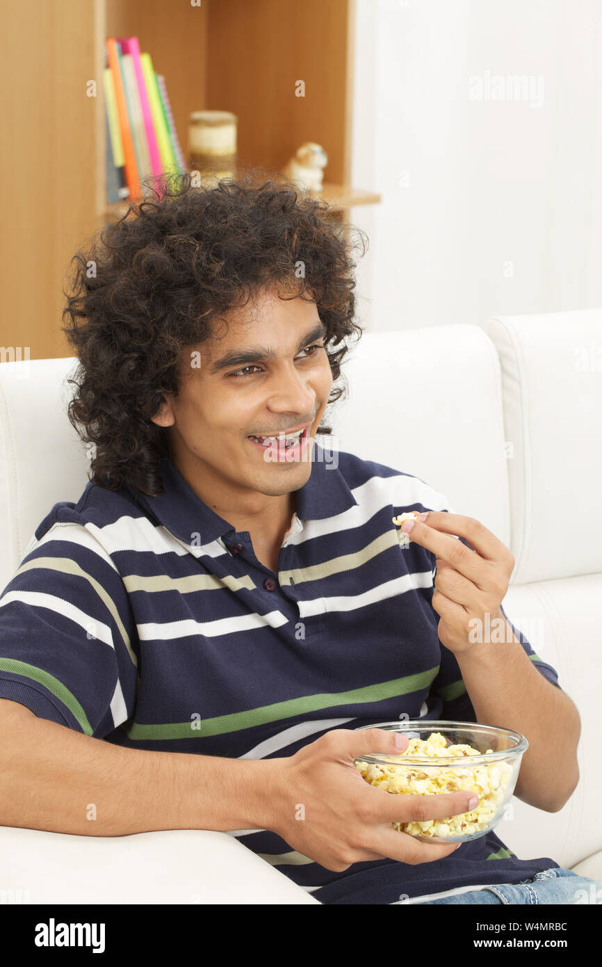 Indian man eating hi-res stock photography and images - Alamy