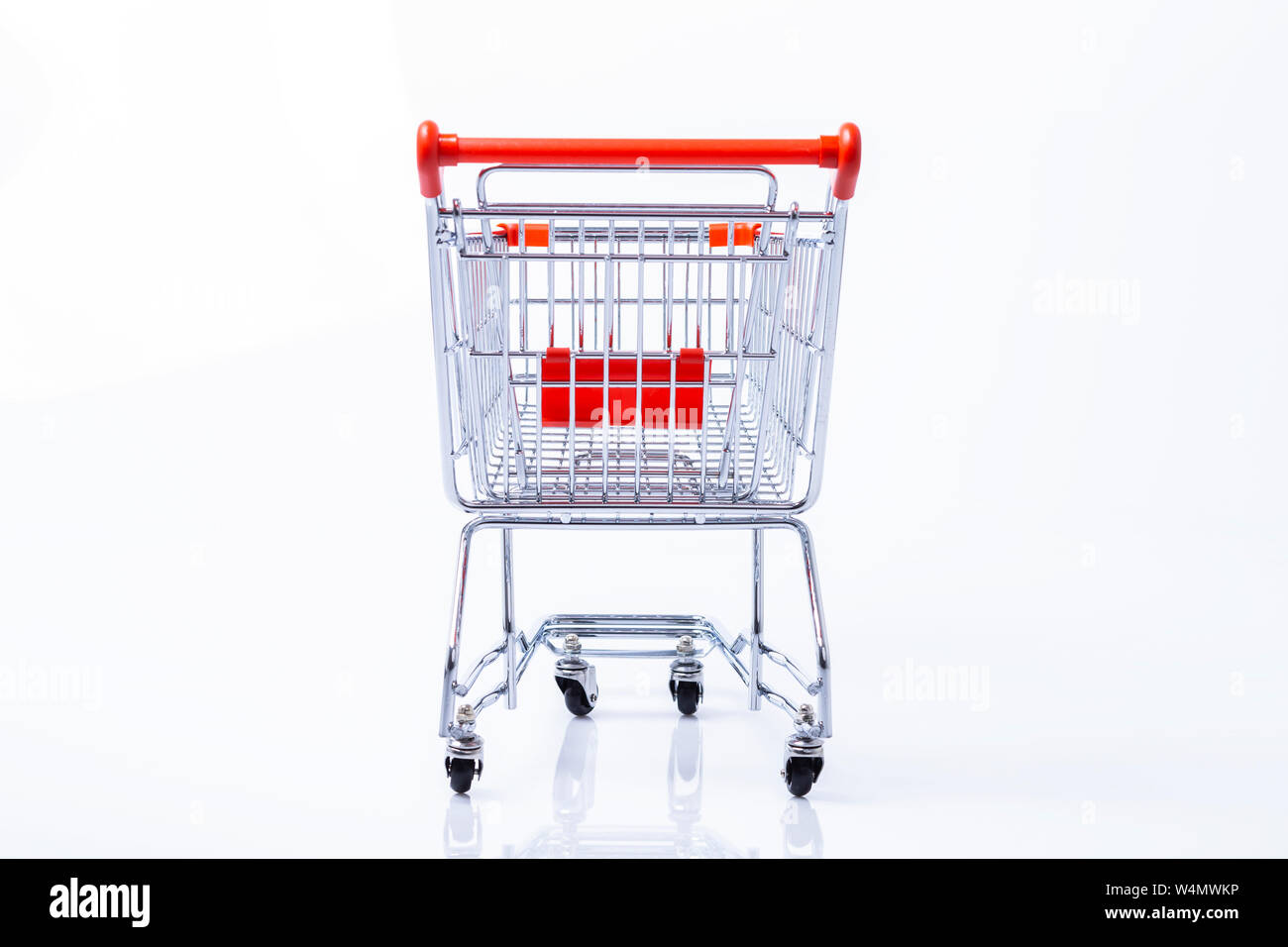 Rear view of an empty shopping trolley, isolated on white background ...