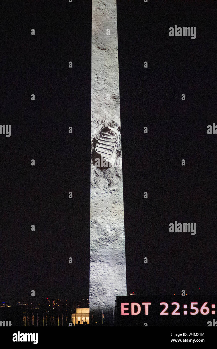 Projected onto the Washington Monument, the photo of Neil Armstrong's ...