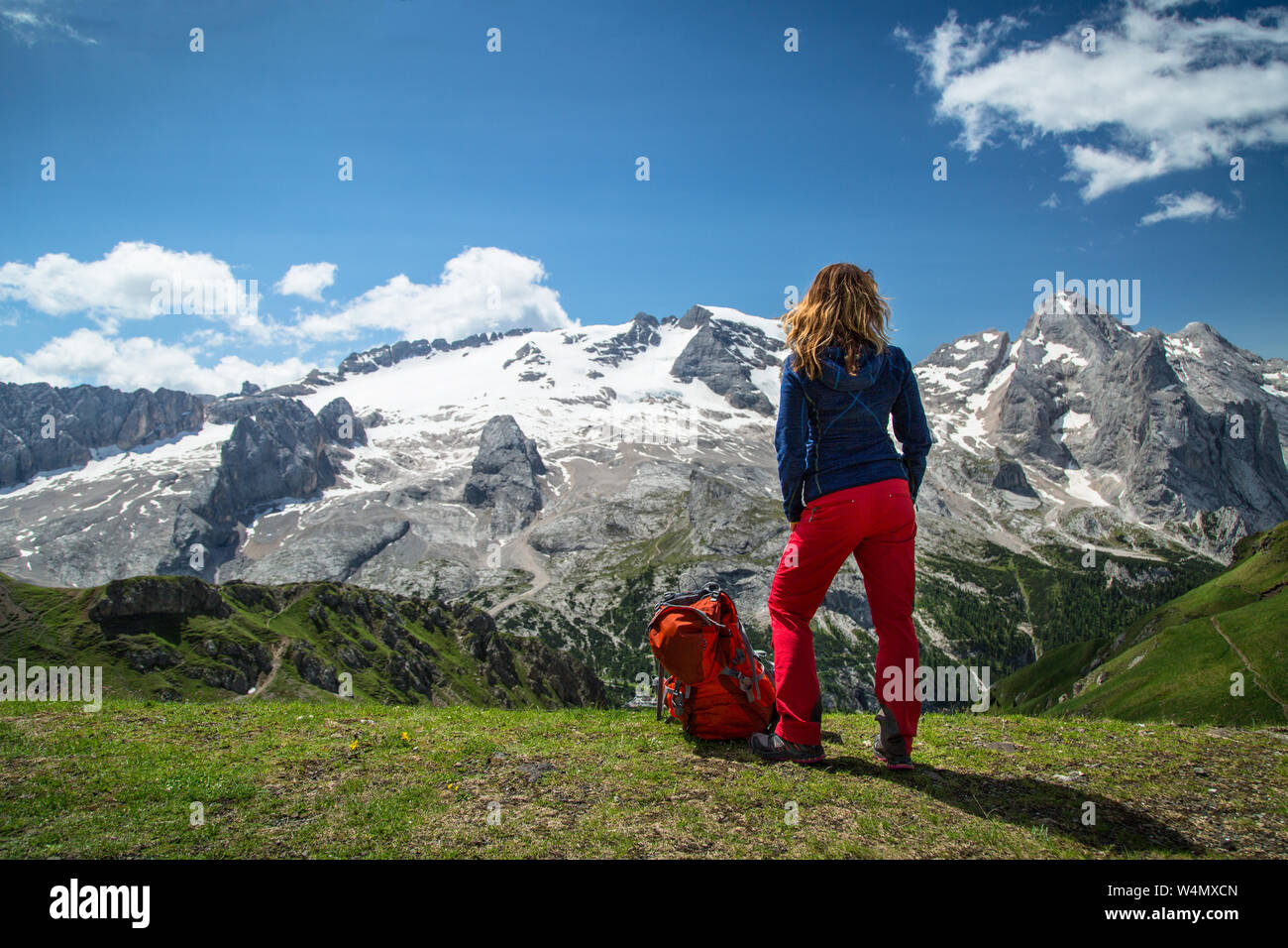 Hiking woman in the Alps, Dolomites, Italy Stock Photo - Alamy