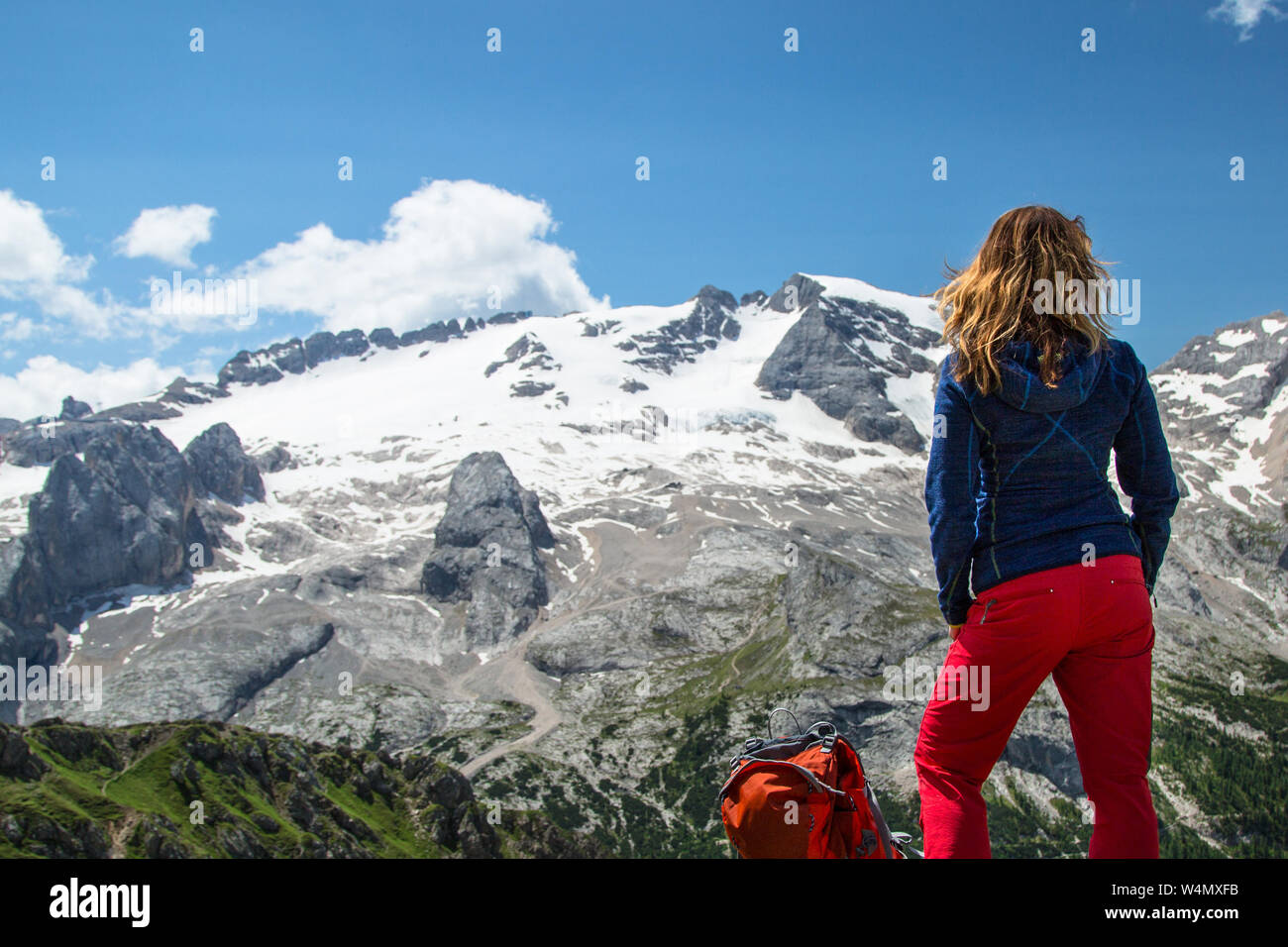 Hiking woman in the Alps, Dolomites, Italy Stock Photo - Alamy