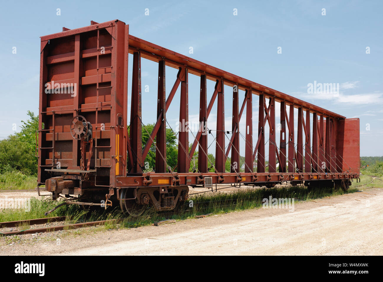Empty railway freight car on side track Stock Photo - Alamy