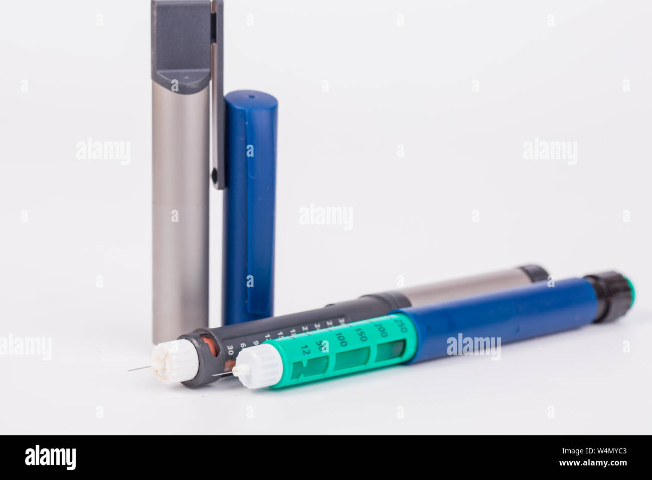insulin pen on white background Stock Photo - Alamy