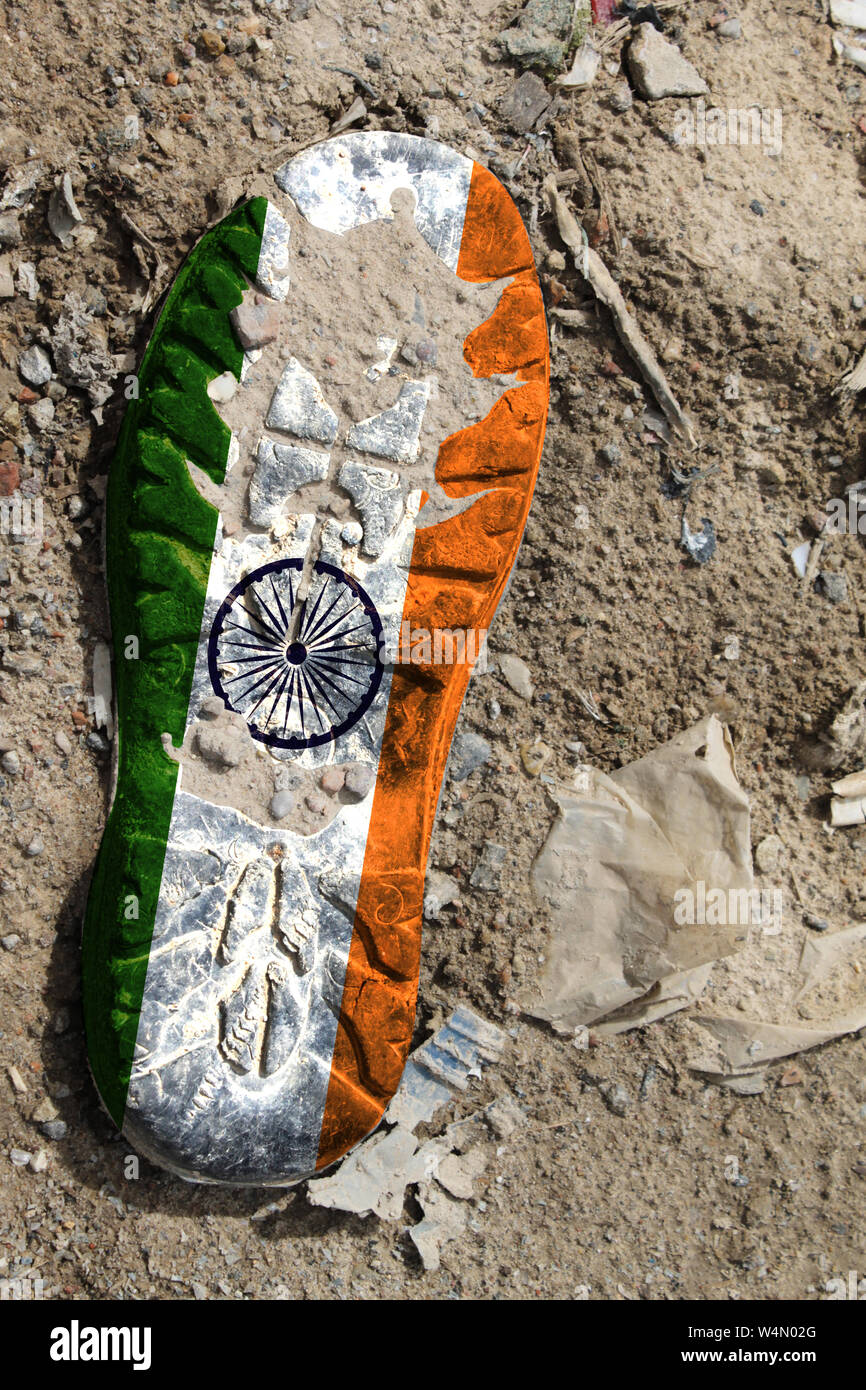 The flag of India is depicted on the sole of an old boot. Ecology ...