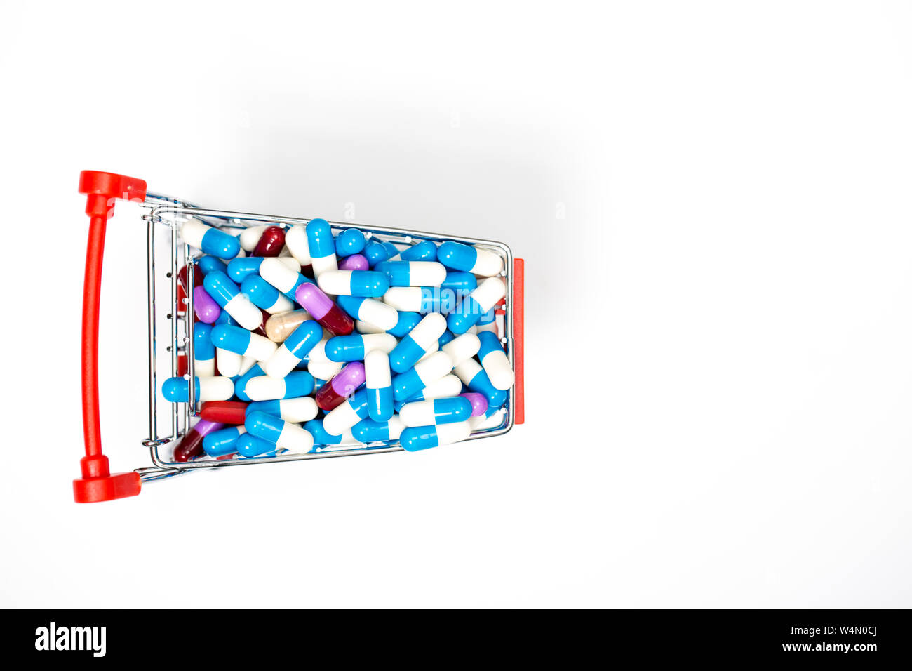 drug capsule on mini cart Stock Photo - Alamy