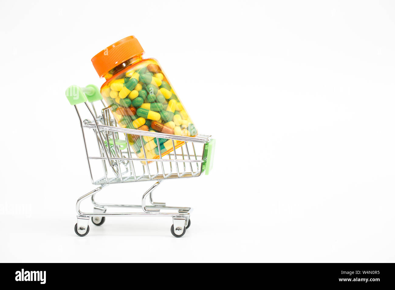 drug capsule on mini cart Stock Photo - Alamy