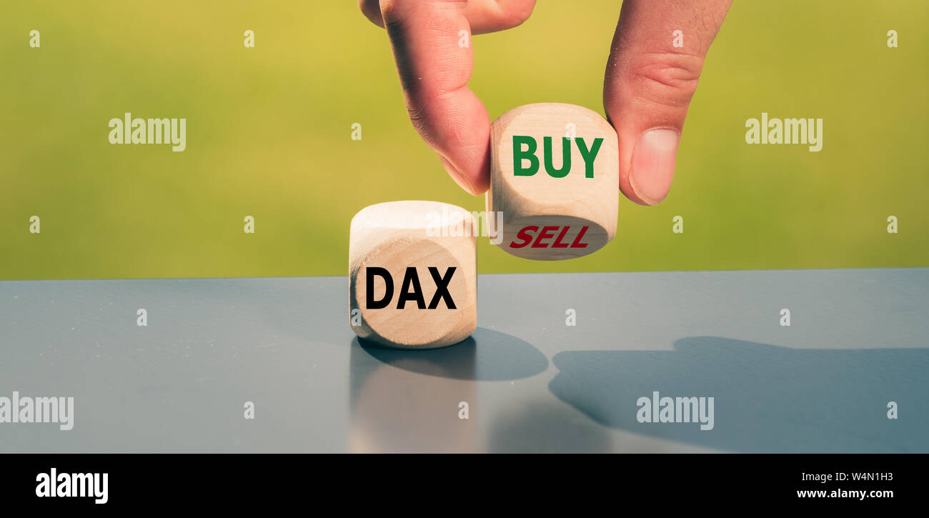 Symbol for buying stocks. Hand turns a cube and changes the word "sell ...