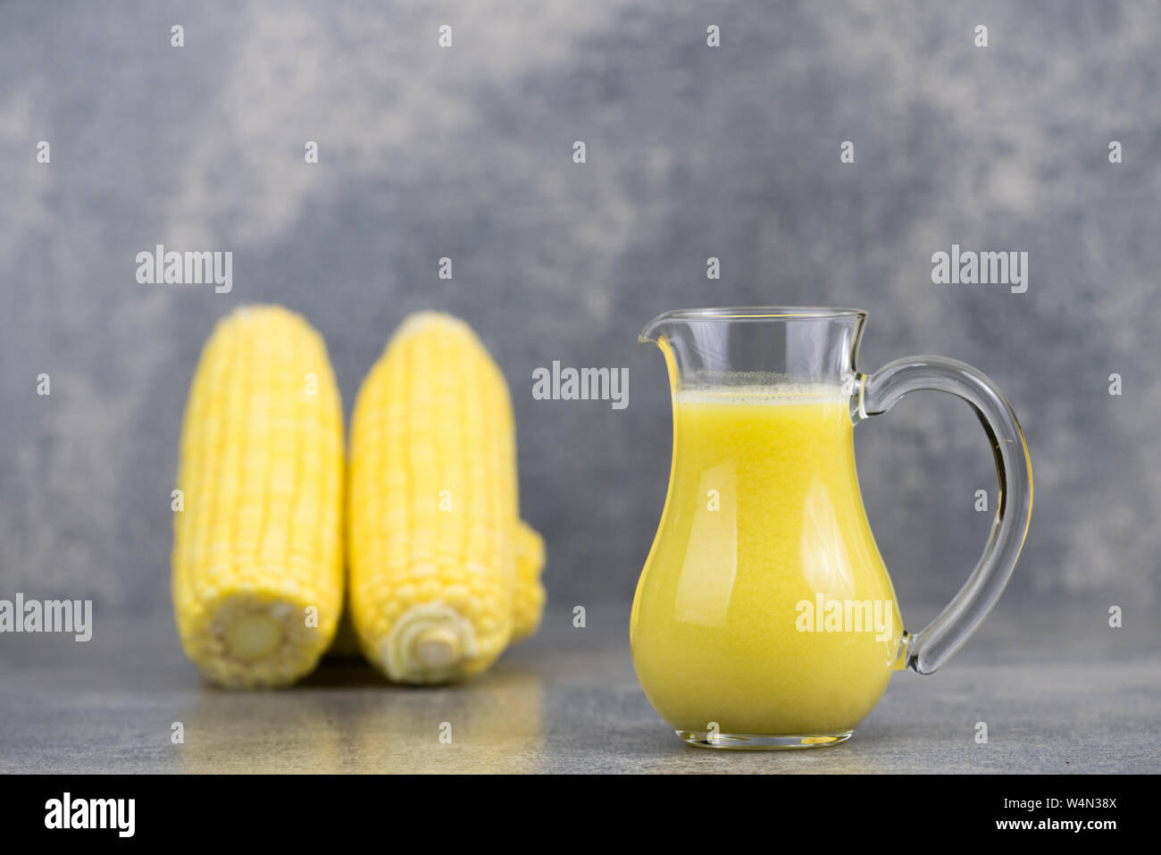 fresh corn and corn milk with concrete background Stock Photo - Alamy