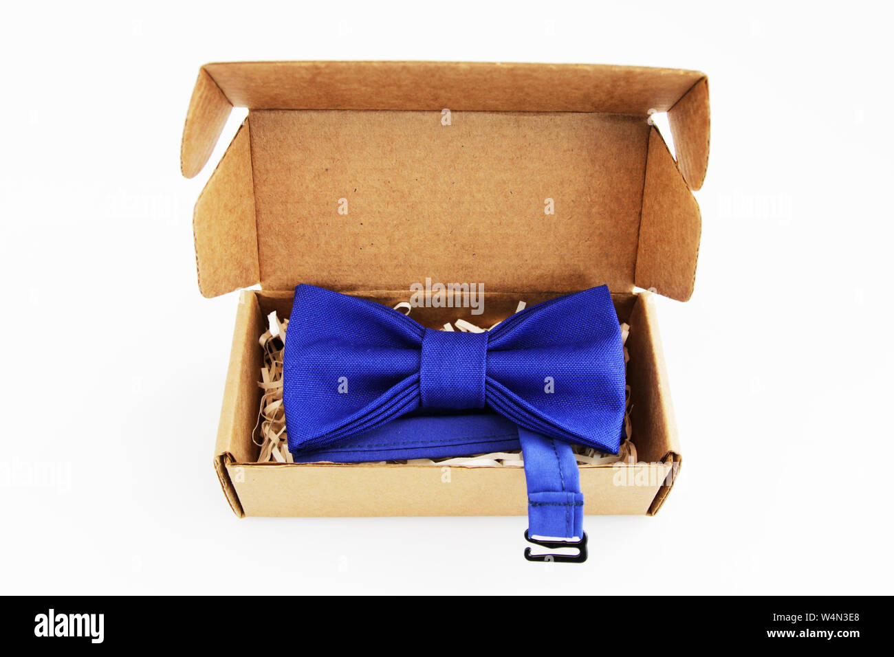 bow tie in a cardboard gift box. Color blue Stock Photo - Alamy