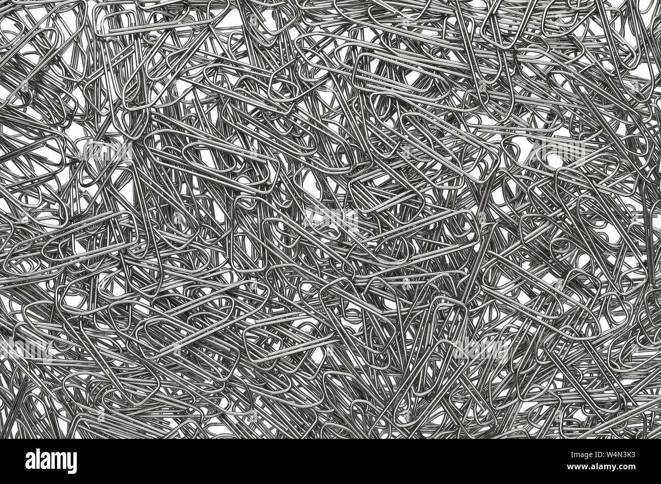 random pile of metal paper clips to use as a stationery background ...