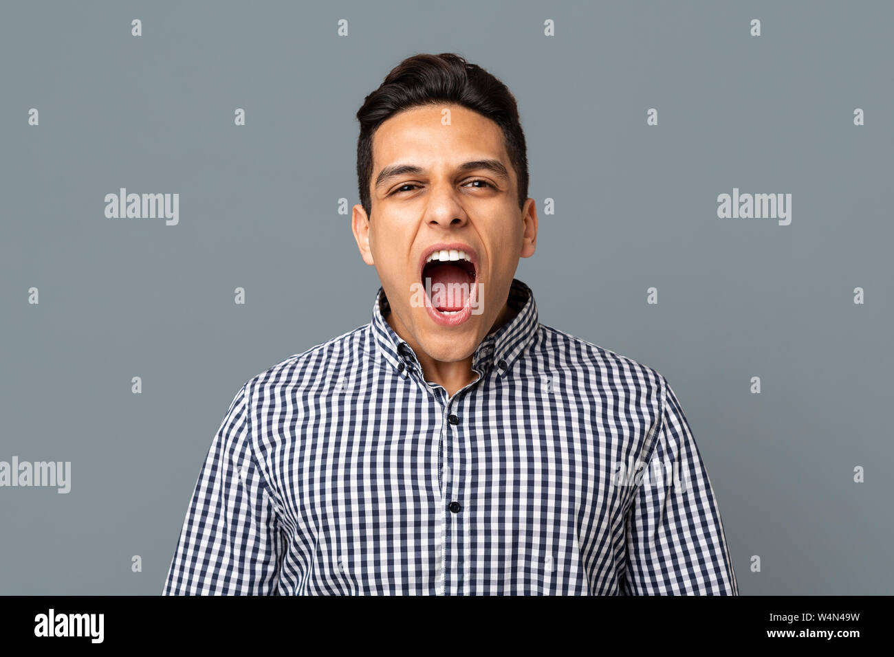 Young man screaming hi-res stock photography and images - Alamy