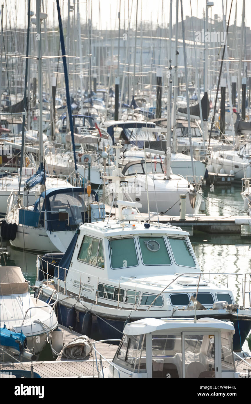 busy boating marina with lots of yachts and small pleasure craft - no ...
