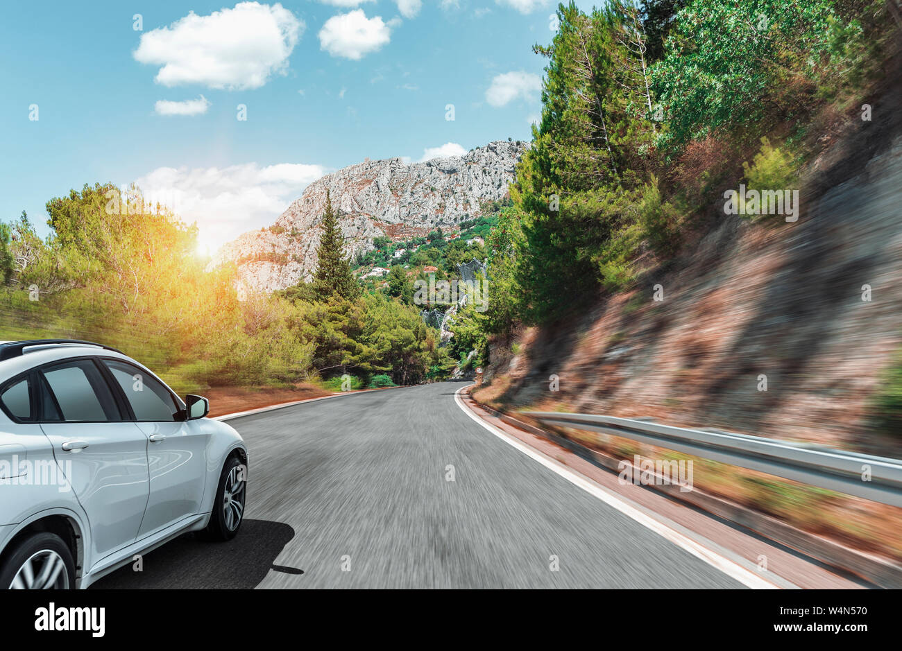 Car moves on mountain road hi-res stock photography and images - Alamy