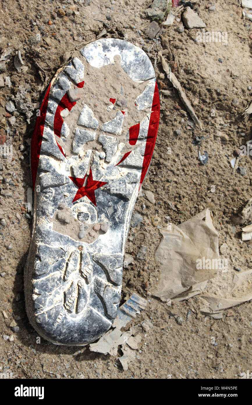 The flag of Turkish Republic of Northern Cyprus is depicted on the sole ...