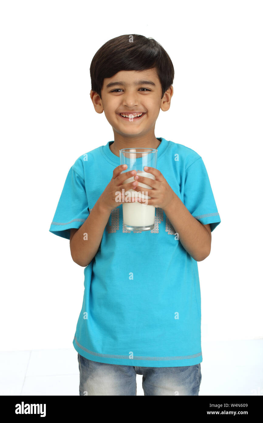 Indian boy drinking milk breakfast hi-res stock photography and images ...