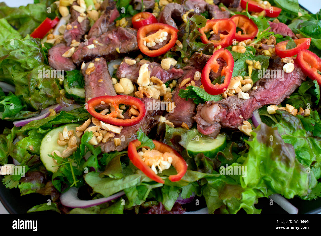 Thai Beef Salad with Ginger Dressing Stock Photo - Alamy