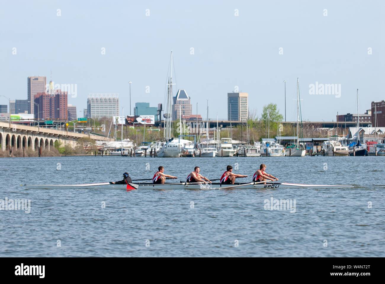 Rowers in a racing shell boat compete in a Johns Hopkins University ...