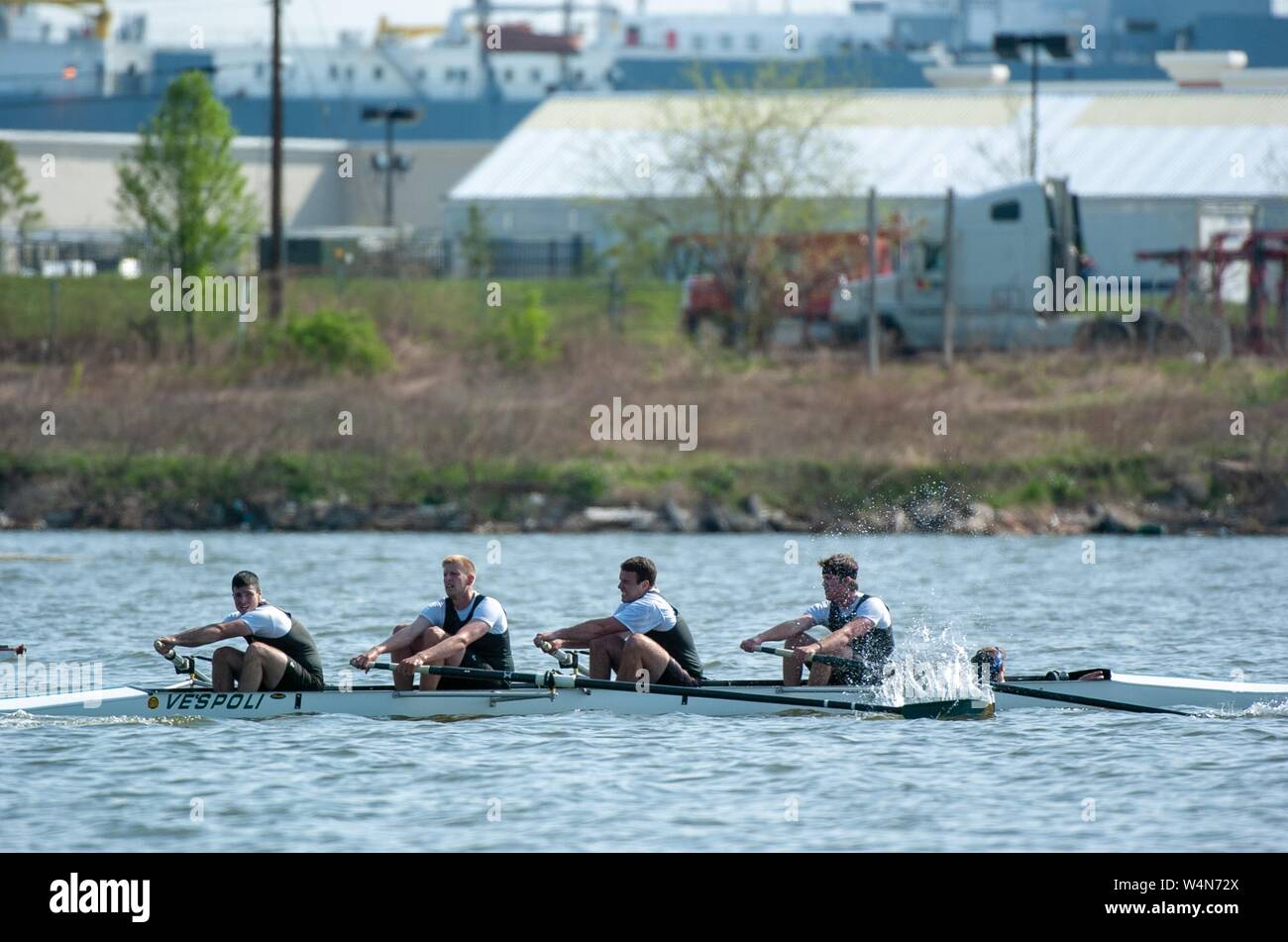 Rowers in a racing shell boat compete in a Johns Hopkins University ...