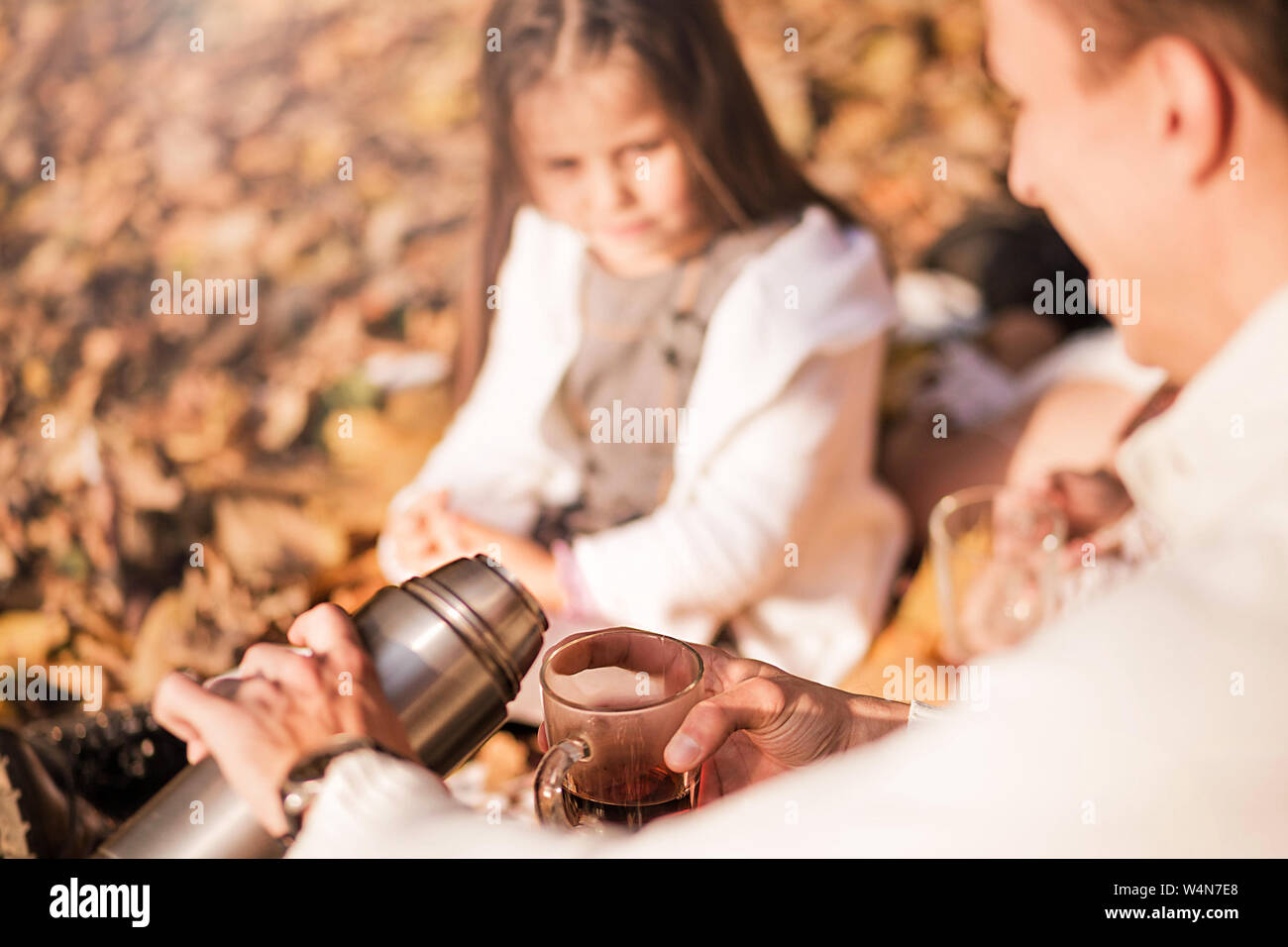 Daughter pours hi-res stock photography and images - Alamy