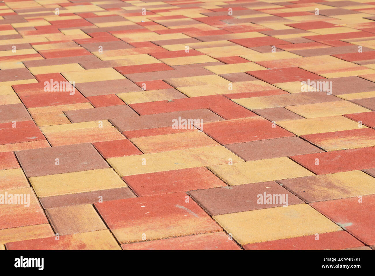 Colourful block paving setts background Stock Photo - Alamy