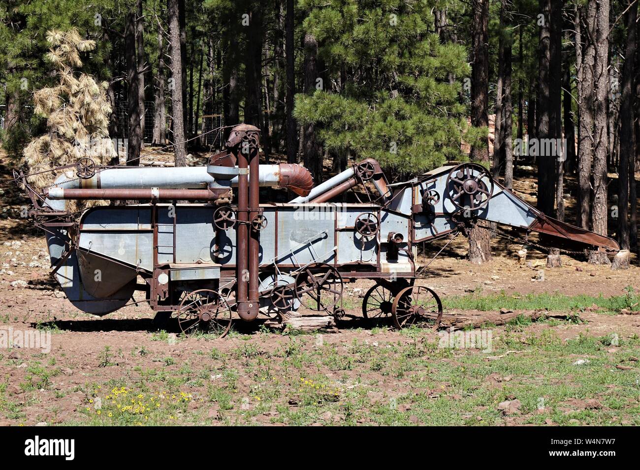 Rusty farm equipment in field hi-res stock photography and images - Alamy