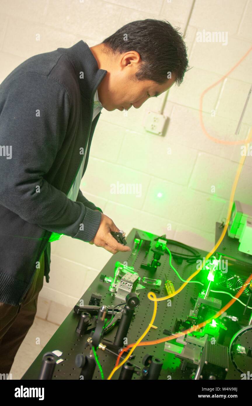 Angled profile shot of Jin Kang, Professor of Electrical and Computer ...