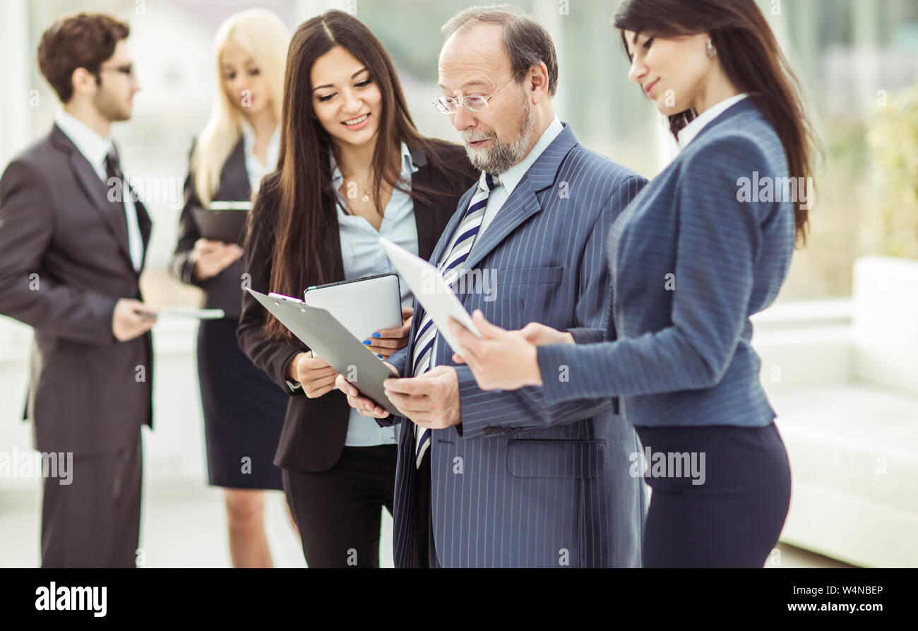 businessman and members of the business team discussing business ...