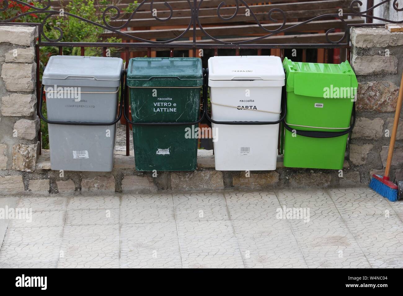 GARGANO, ITALY - JUNE 6, 2017: City waste sorting bins in Gargano ... GARGANO, ITALY - JUNE 6, 2017: City waste sorting bins in Gargano ...