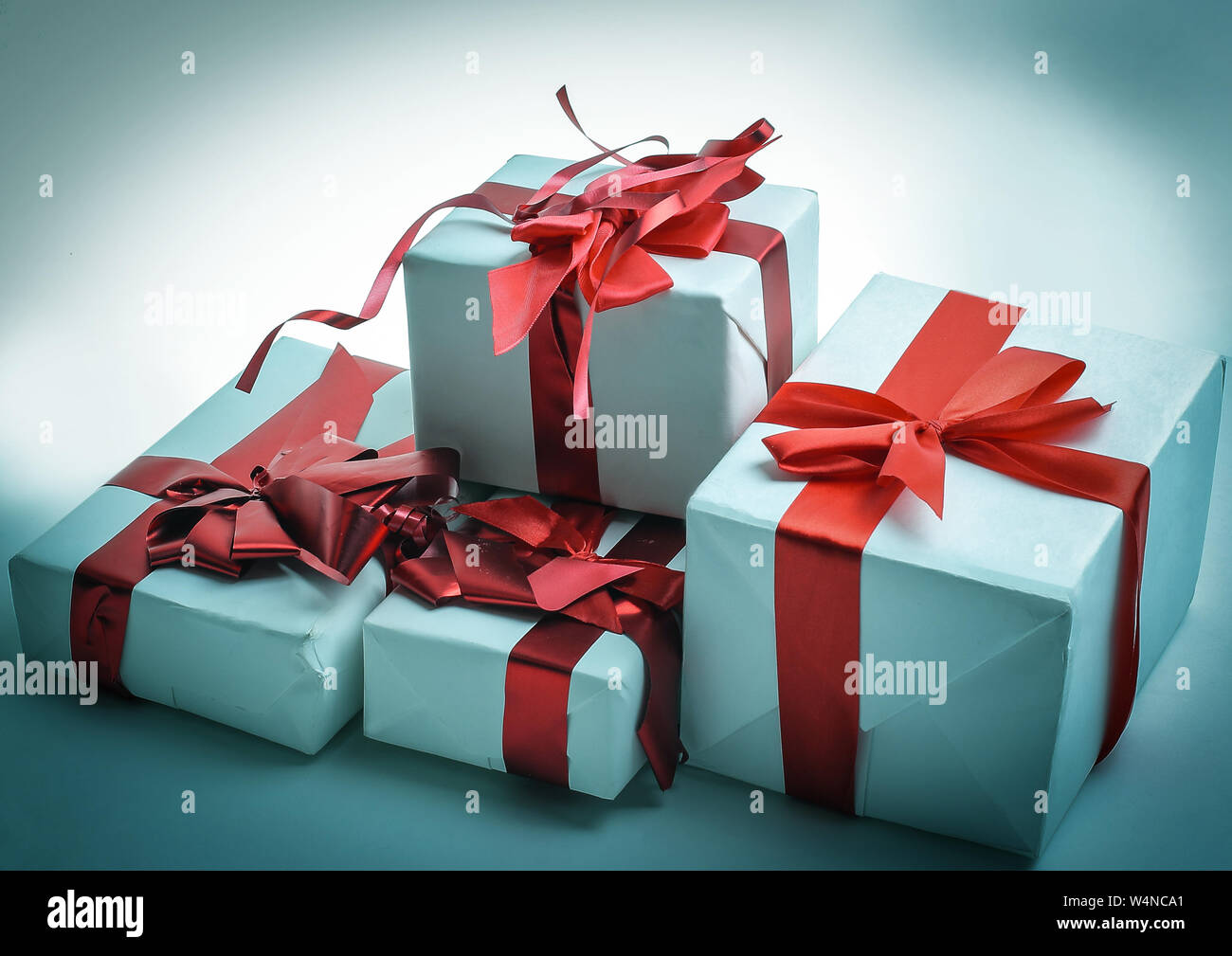 closeup.boxes with gifts with a beautiful red ribbon .isolated on white ...