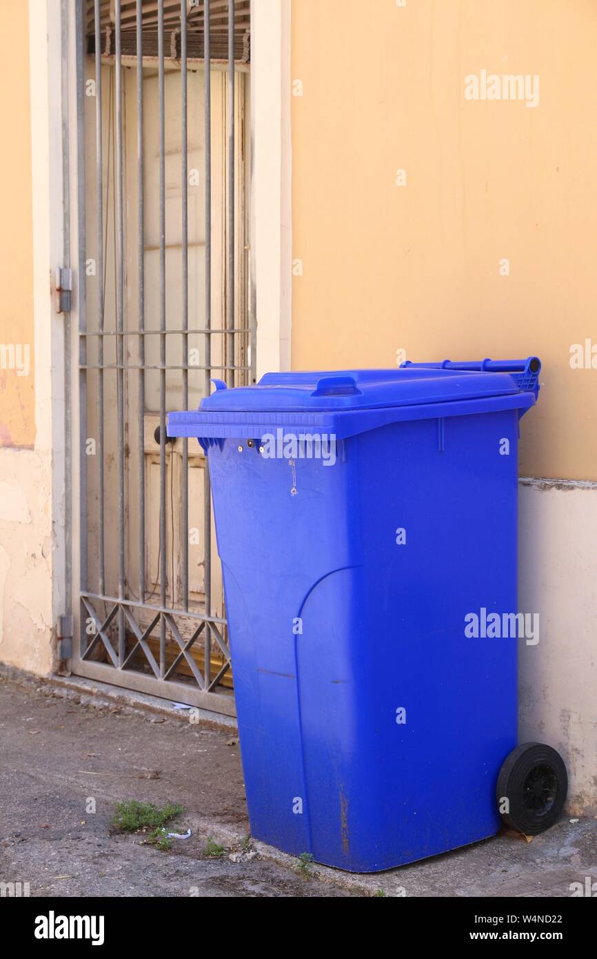 Waste sorting for recycling - garbage bin colors in Italy. Domestic ...