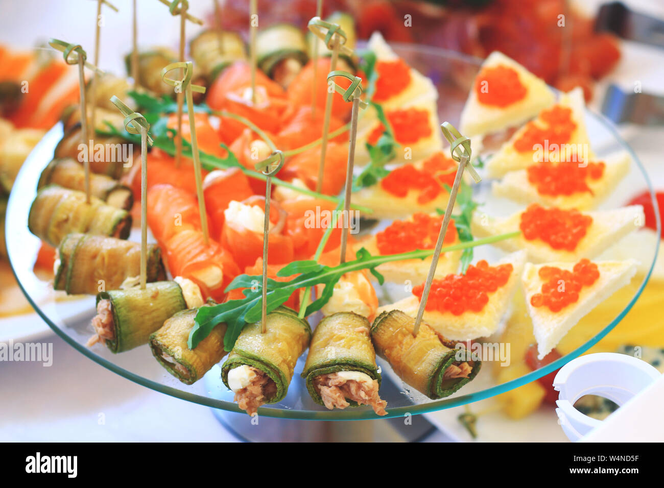 catering table set service with silverware and glass stemware at ...