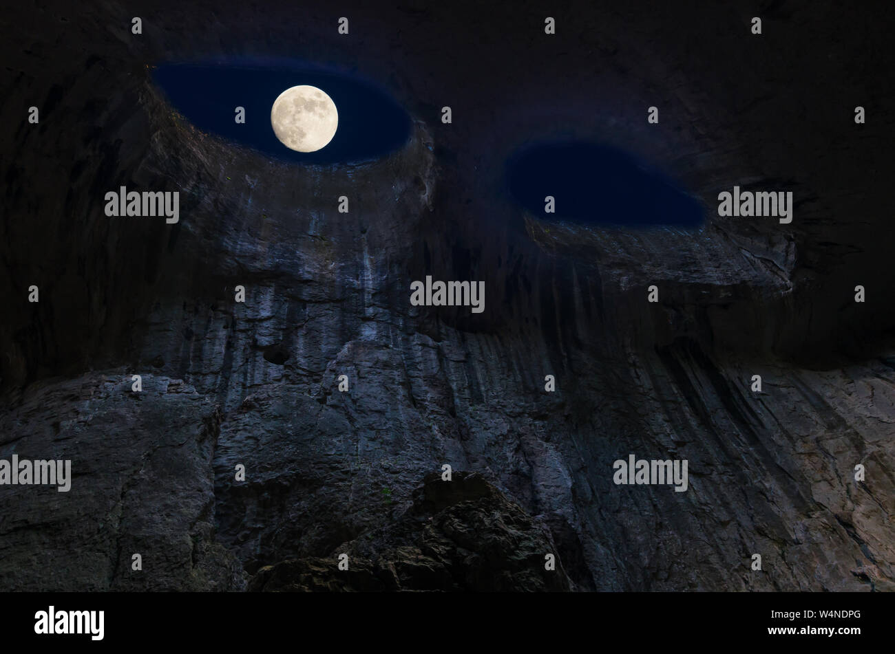 Prohodna cave, Bulgaria. It is known as The Eyes of God. Located near ...