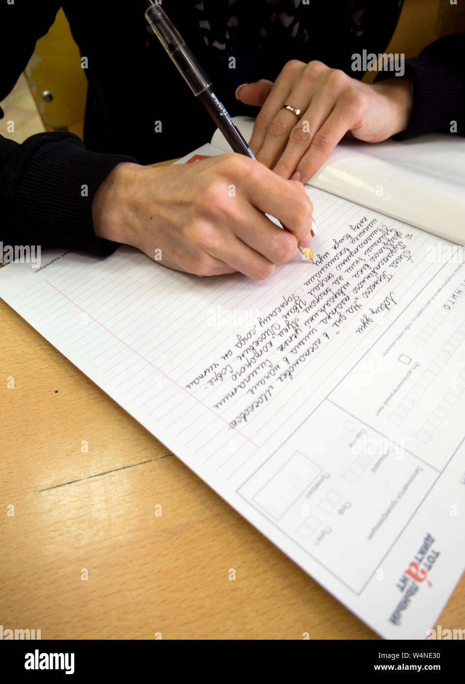 Human writes "Total dictation" on letterhead Stock Photo - Alamy