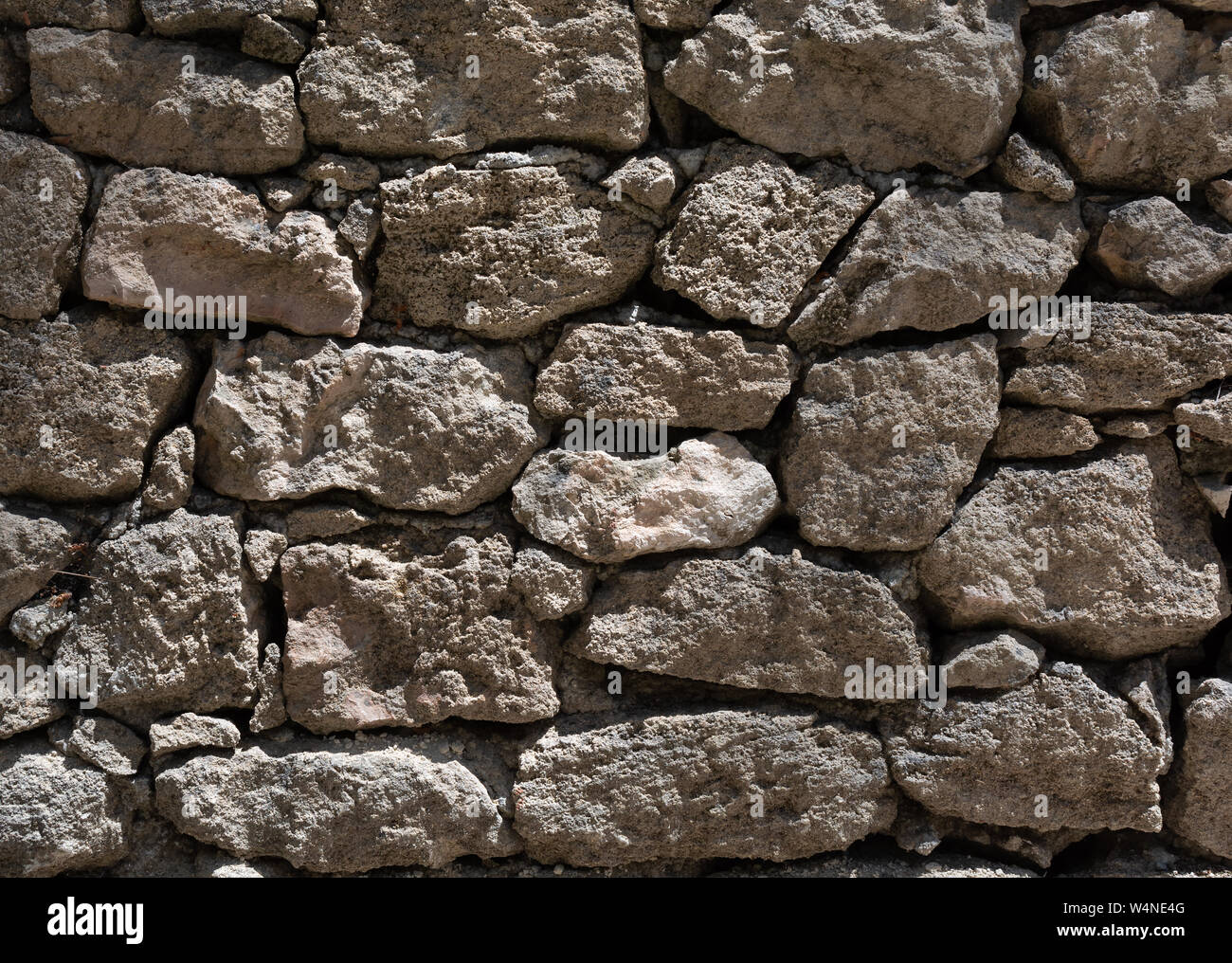 Sunlight on stone wall backdrop hi-res stock photography and images - Alamy