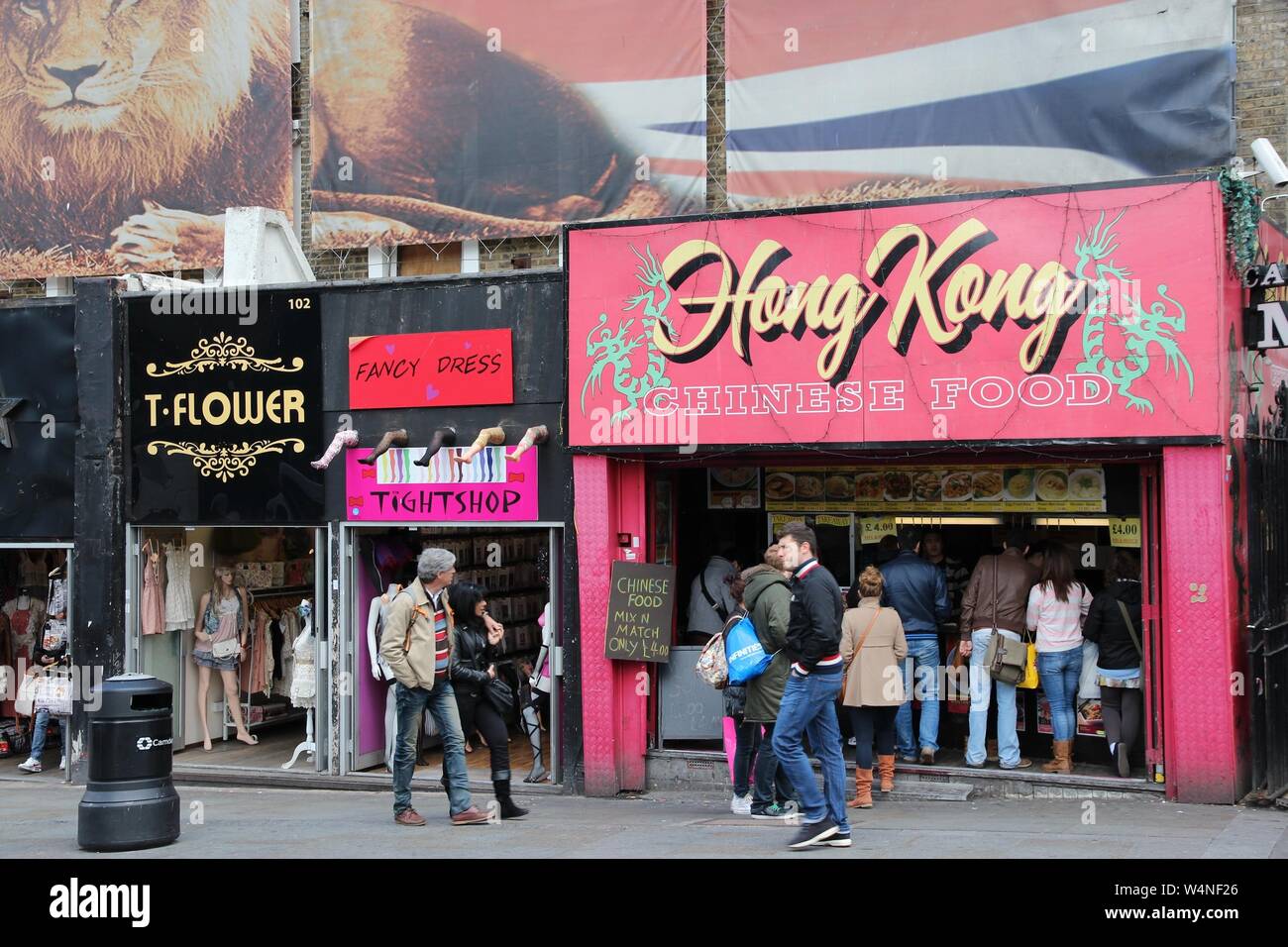 LONDON, UK - MAY 15, 2012: Visitors walk along shops in Camden Town ...