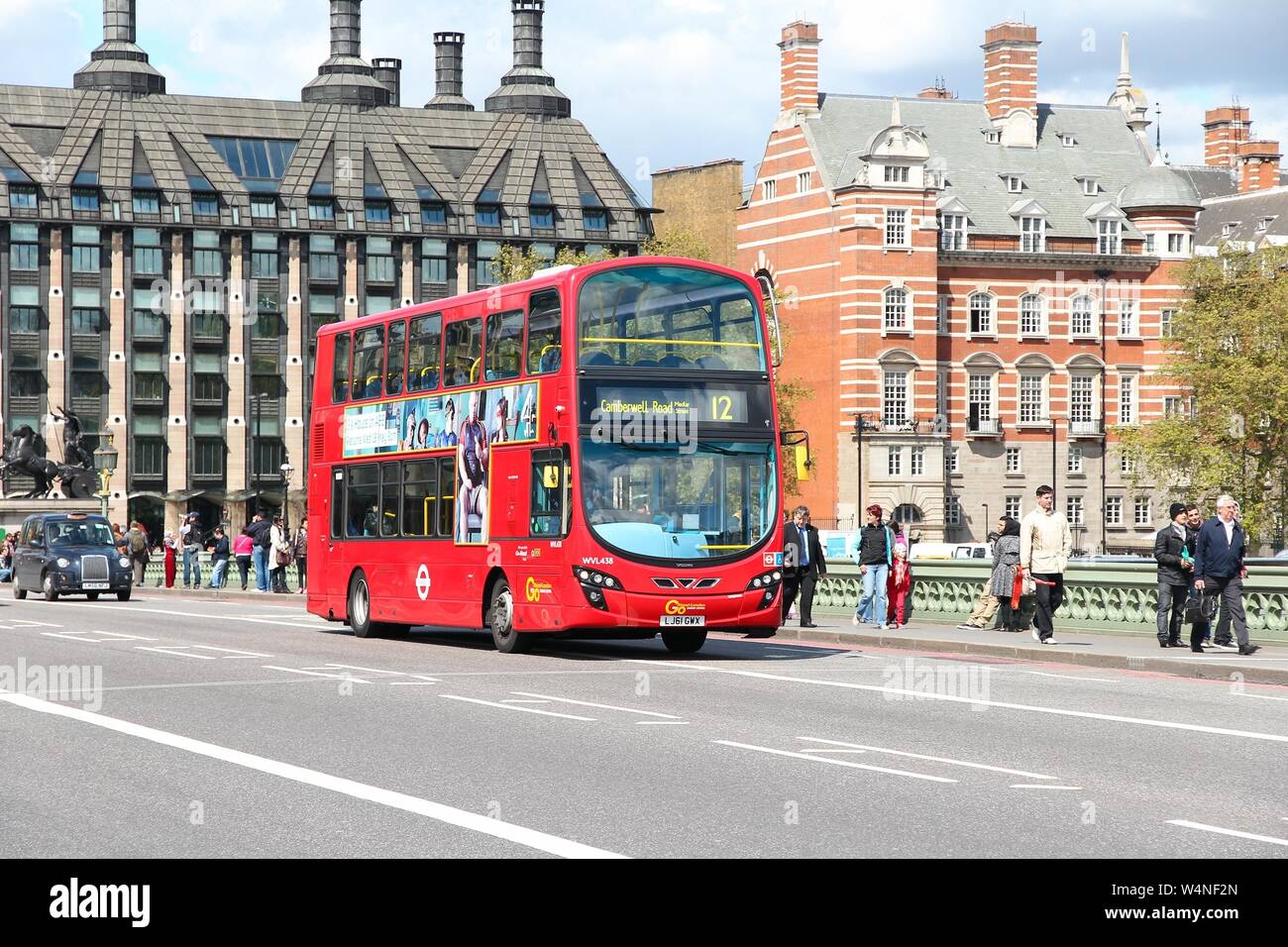 LONDON, UK - MAY 16, 2012: People ride London Bus in London. As of 2012 ...