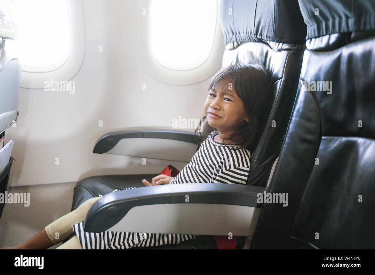 little girl alone afraid crying sitting Stock Photo - Alamy