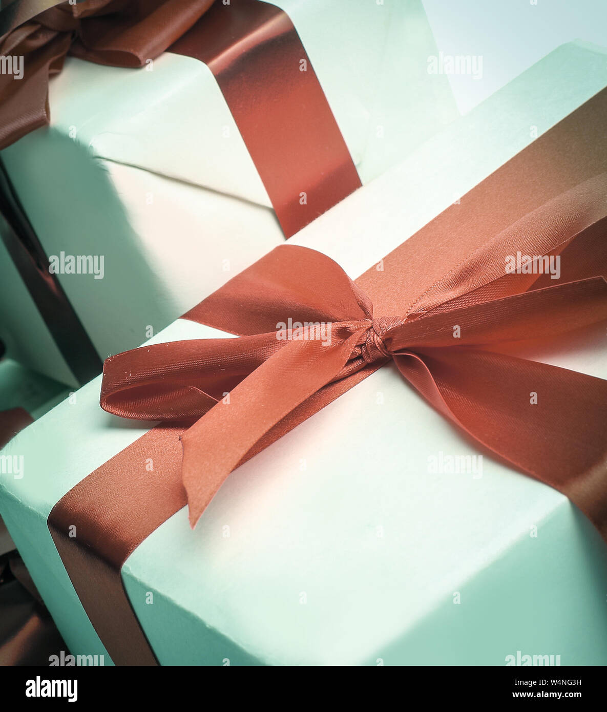closeup.boxes with gifts with a beautiful red ribbon .isolated on white ...