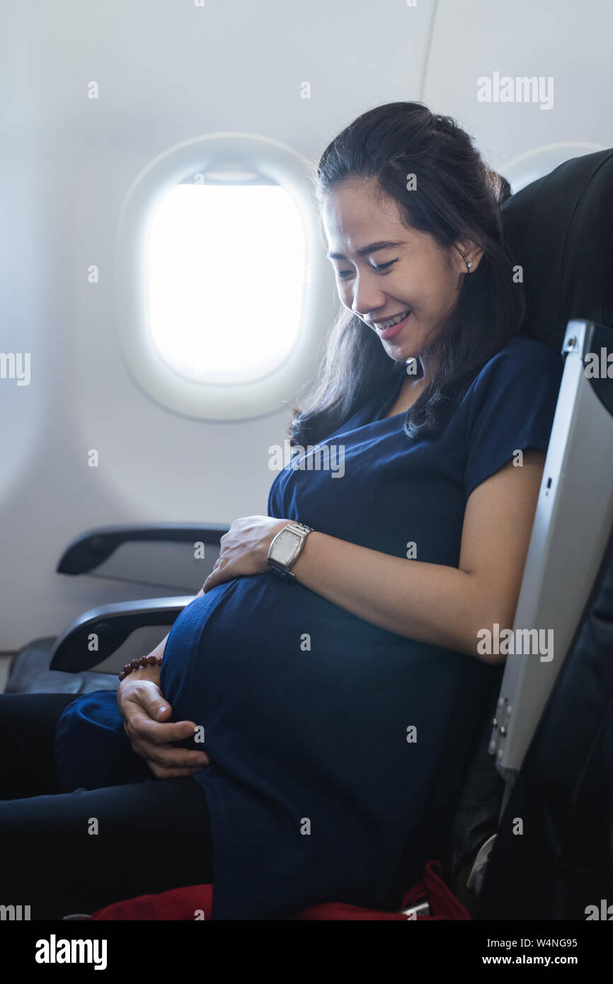 Pregnant Belly Airplane High Resolution Stock Photography and Images ...