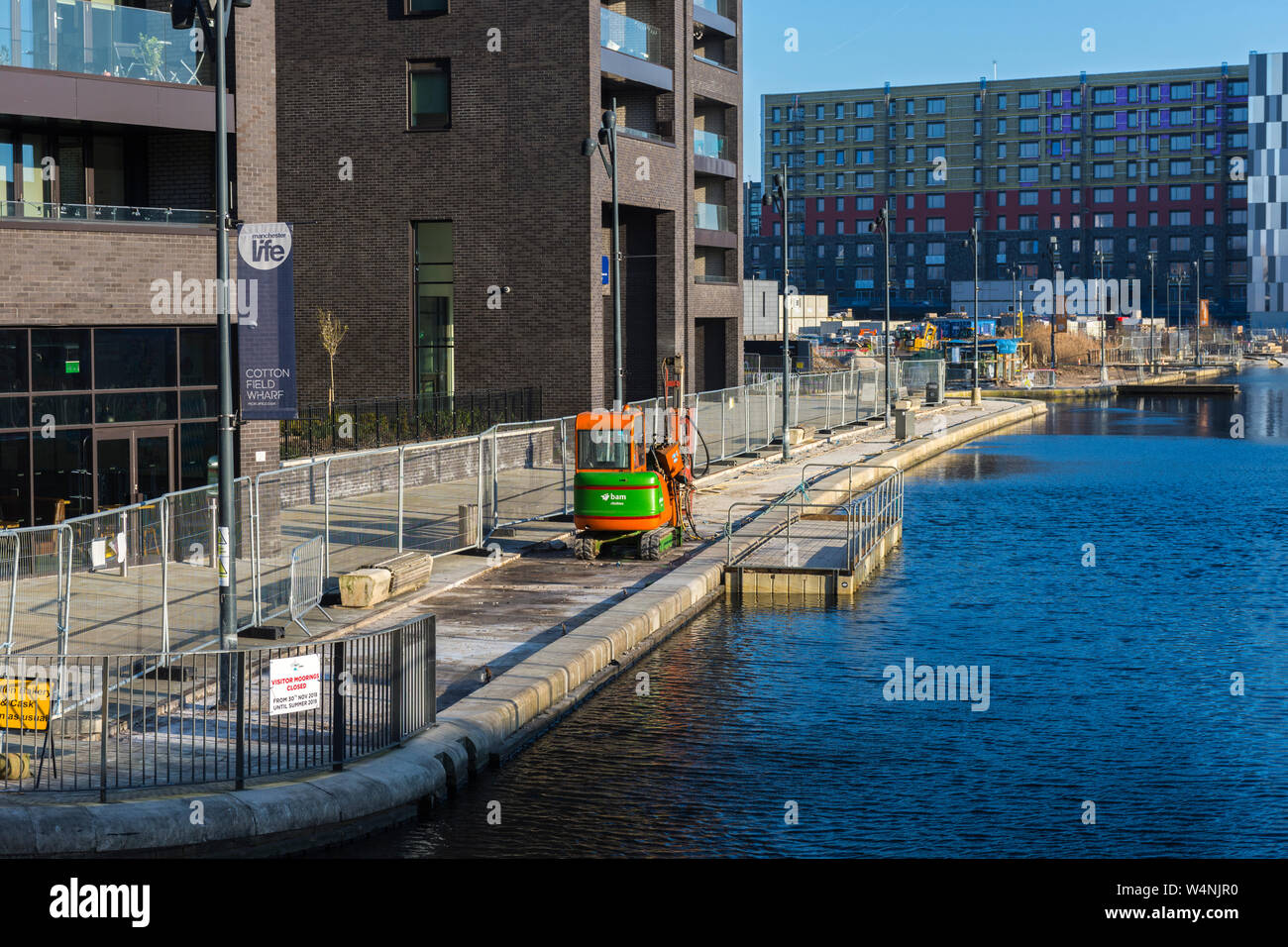 Pavement area outside the Cotton Field Wharf apartments undergoing ...