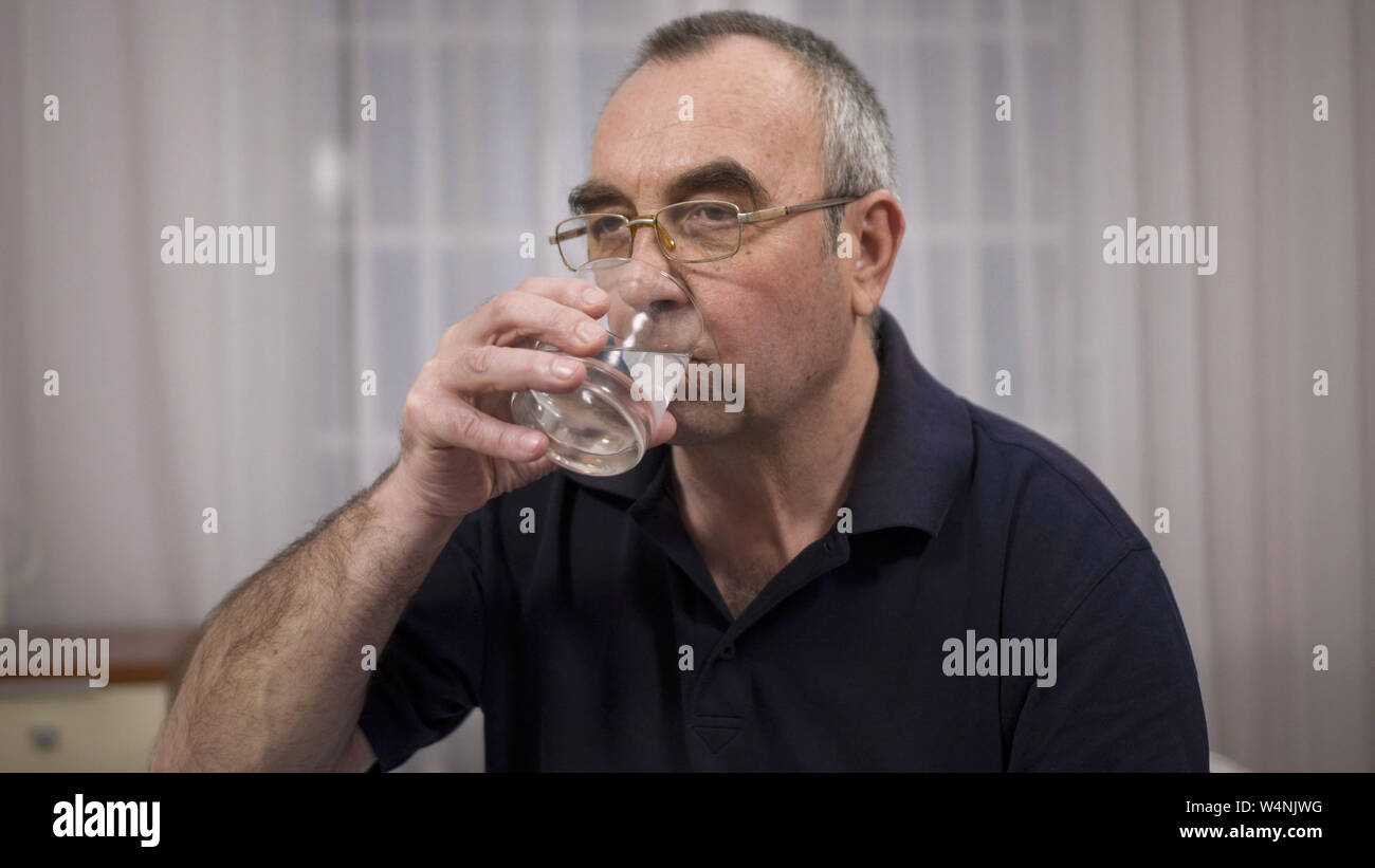 Very thirsty elderly person hi-res stock photography and images - Alamy