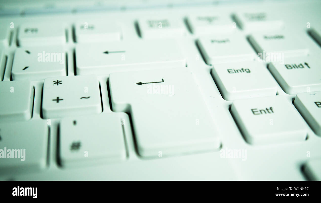 white keyboard enter key Stock Photo - Alamy