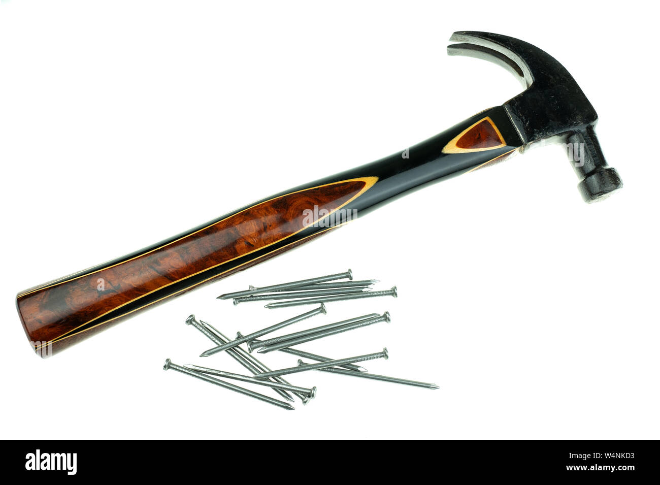 Old traditional curved claw hammer and nail on white background Stock ...