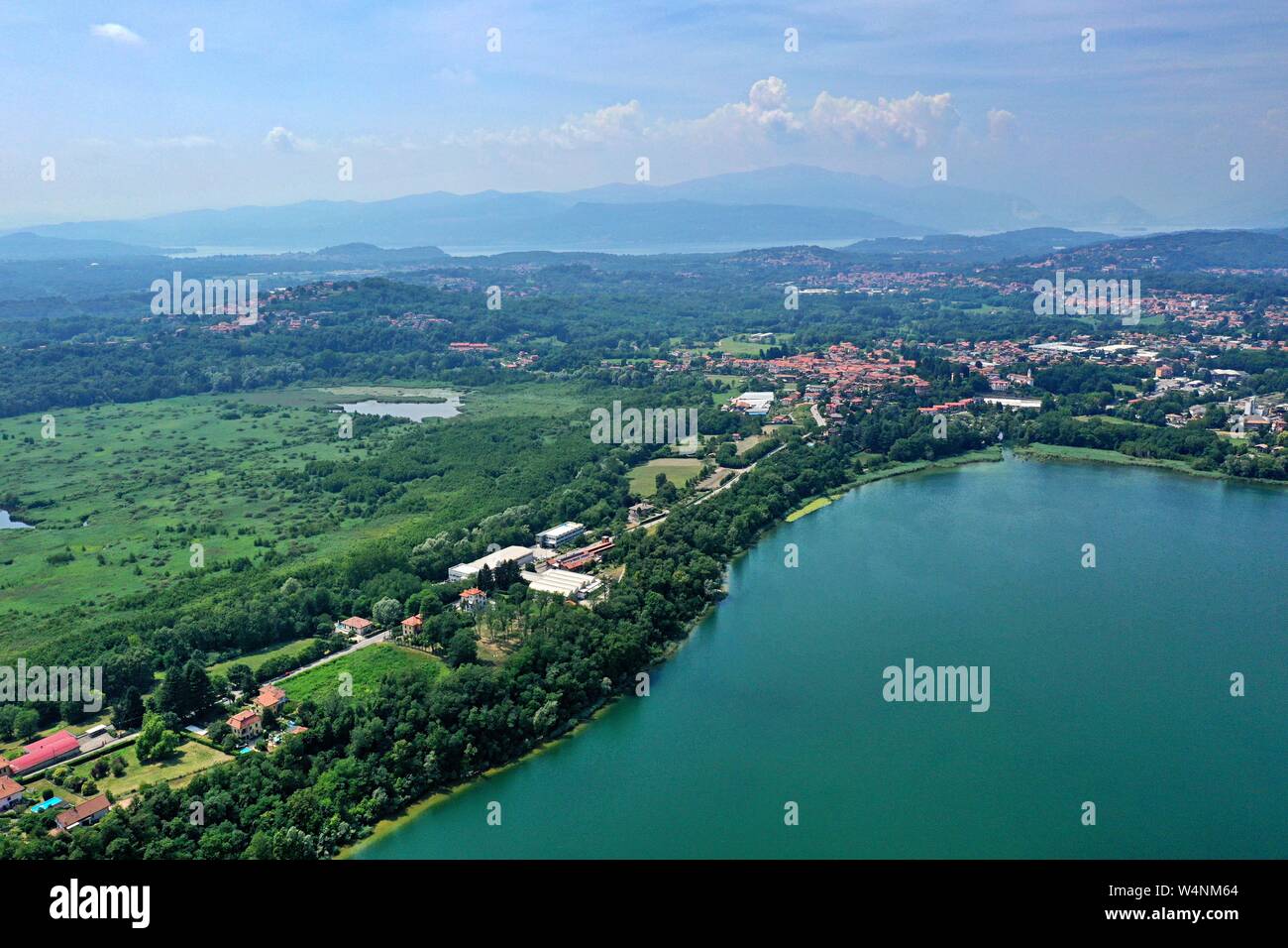 aerial view of Lake Varese with the cities of Gavirate, Biandronno ...